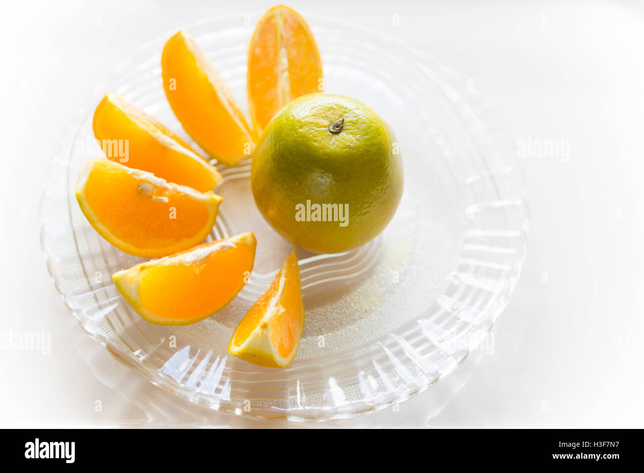 Fresh Brazilian orange (Laranja-Pêra) fruit cutted, whole fruit, on ...