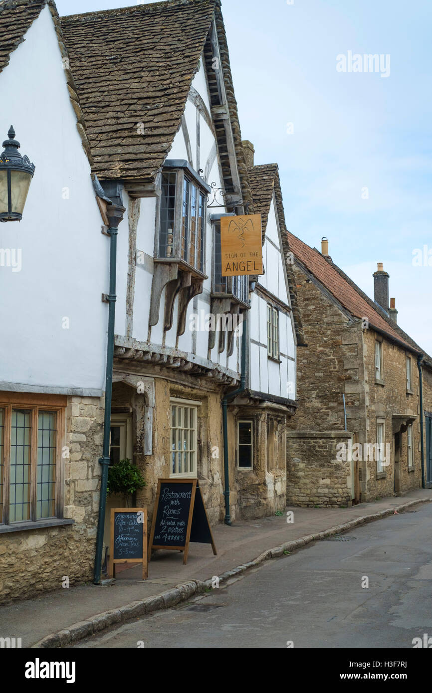 Lacock village Wiltshire england UK The sign of the Angel Inn Stock ...