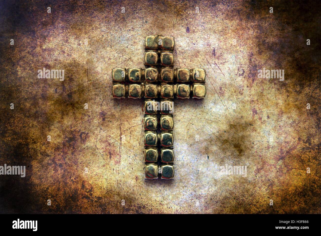 Metal cross on grunge background Stock Photo - Alamy