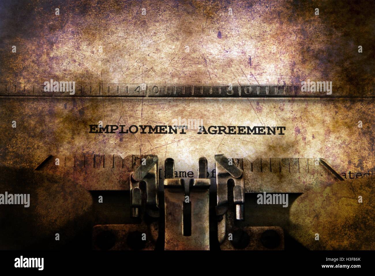 Employment contract on vintage typewriter Stock Photo - Alamy