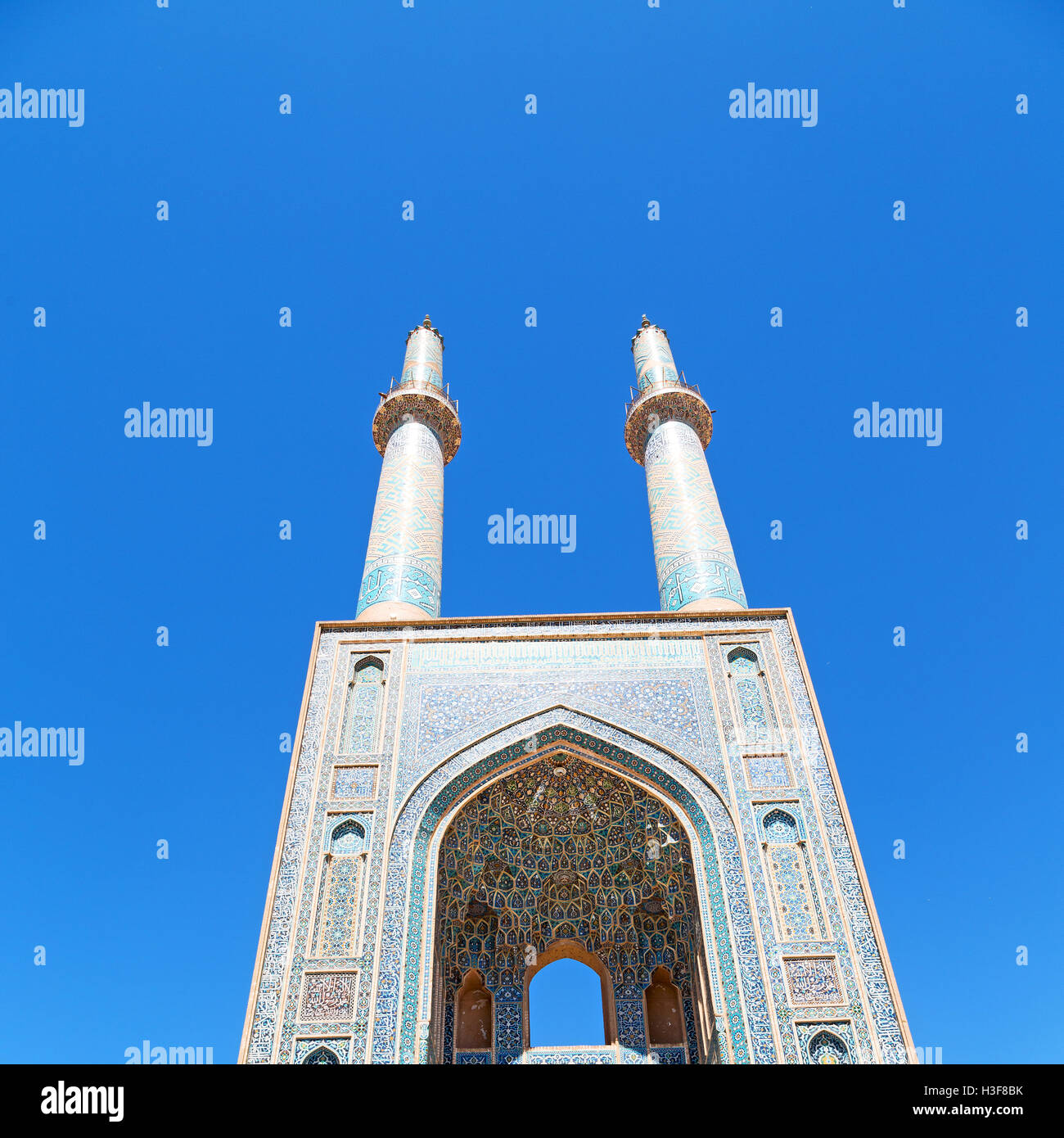 in iran blur islamic mausoleum old architecture mosque minaret near the sky Stock Photo - Alamy