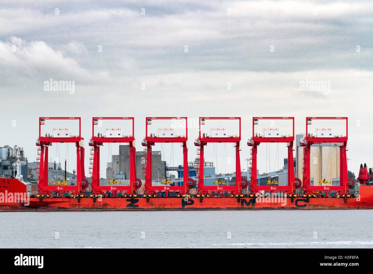 Red saddle container cranes positioned at Liverpool Docks, Seaforth ...
