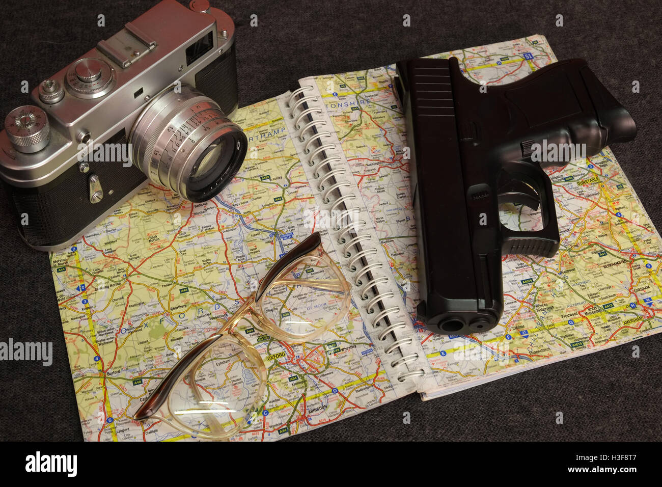 Russian spy gun book hi-res stock photography and images - Alamy