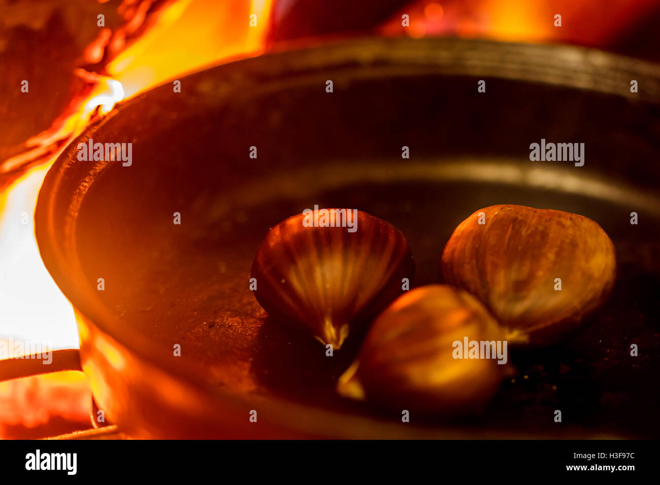 Chestnuts Roasting on a Wood Fire Stock Photo - Alamy