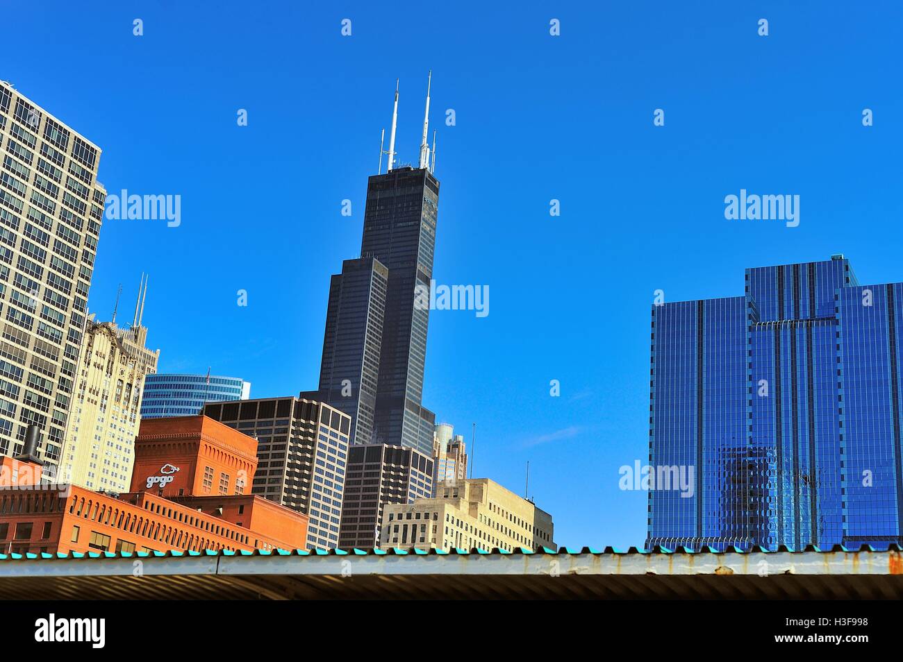 Chicago's Willis Tower (formerly the Sears Tower) rising above its ...