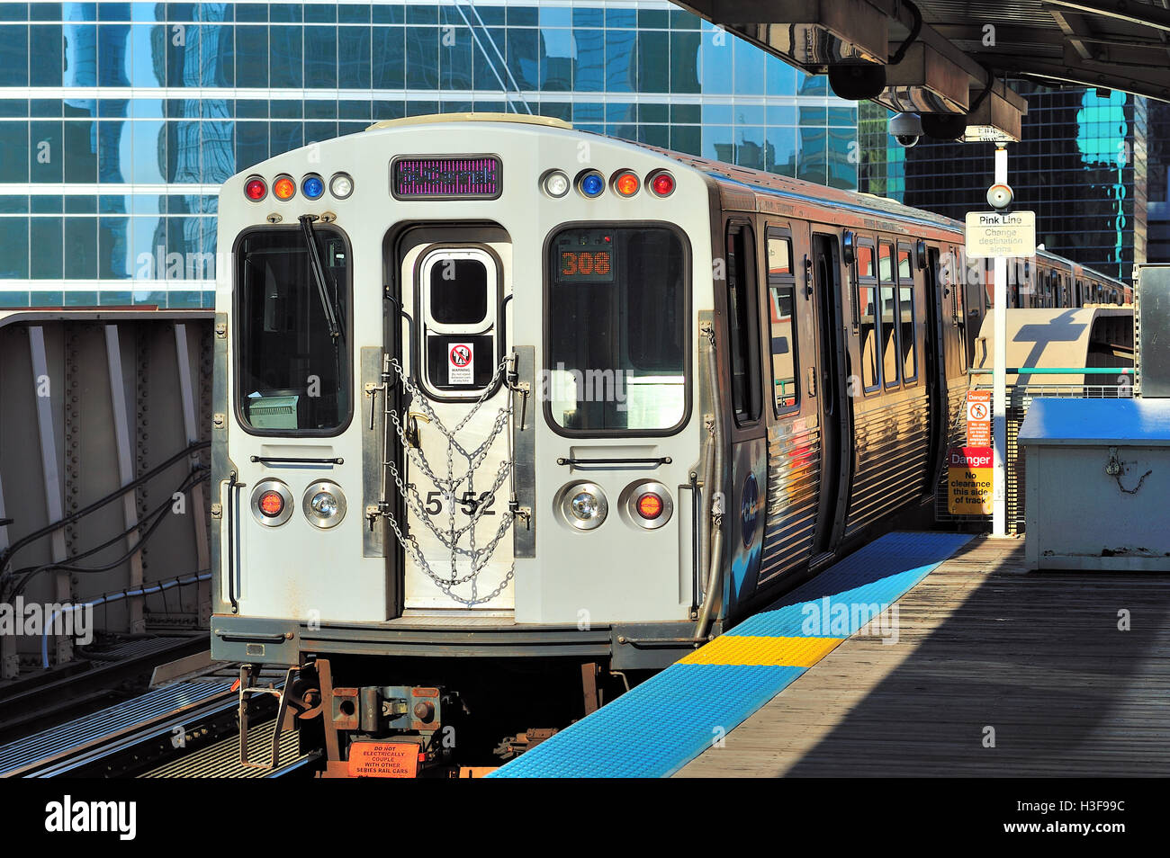 A CTA Pink Line train departing Chicago's Clinton Street Station during ...