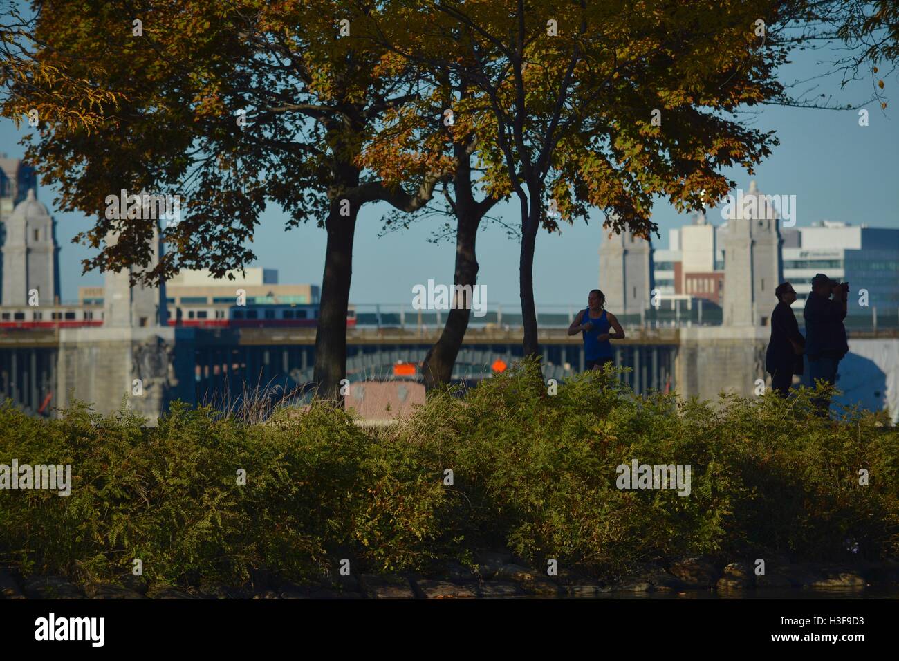 A MBTA red line subway heavy rail train crossing the Longfellow Bridge ...