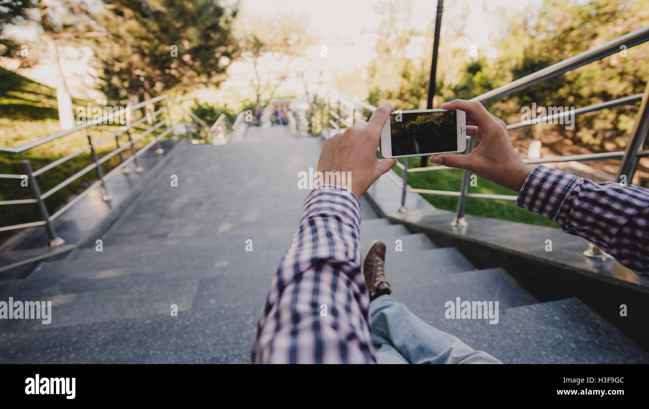 Young man photographing waterfall hi-res stock photography and images ...