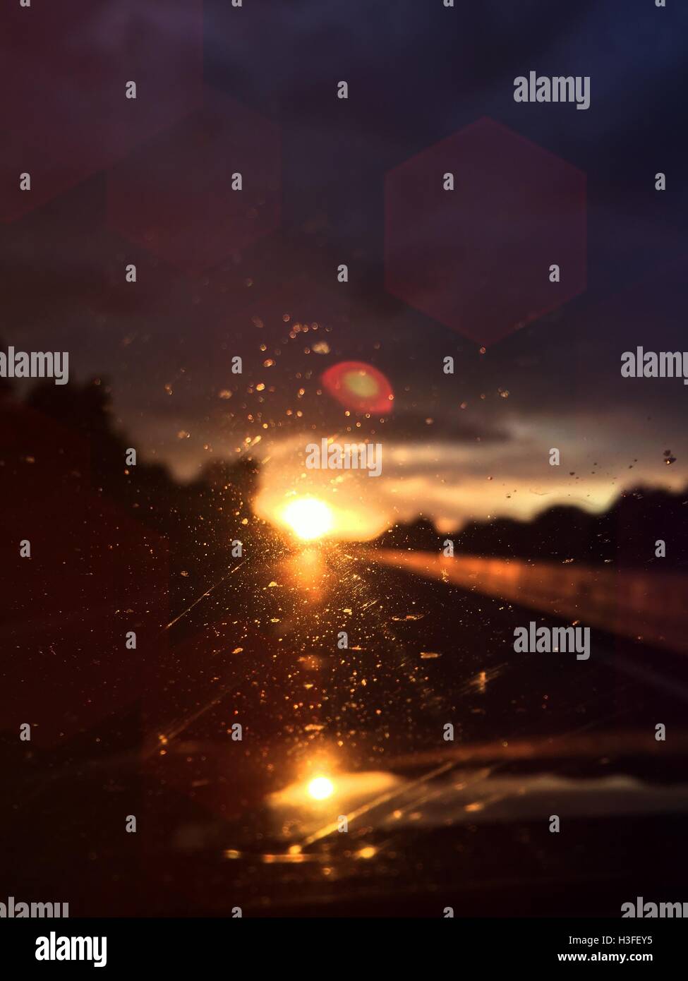 Traveling. With the sunset Stock Photo - Alamy