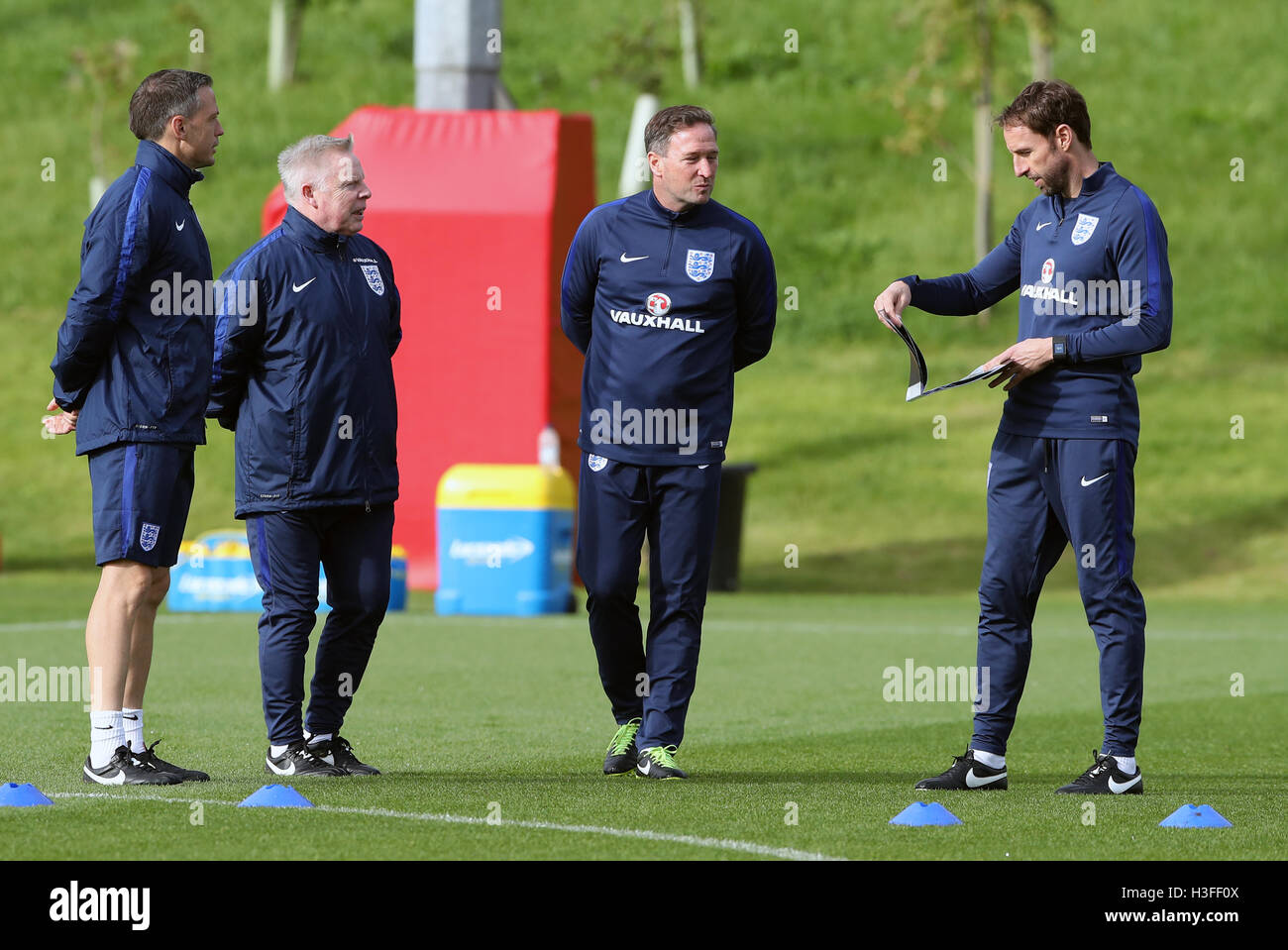 England manager Gareth Southgate (right) with coaches, Steve Holland ...