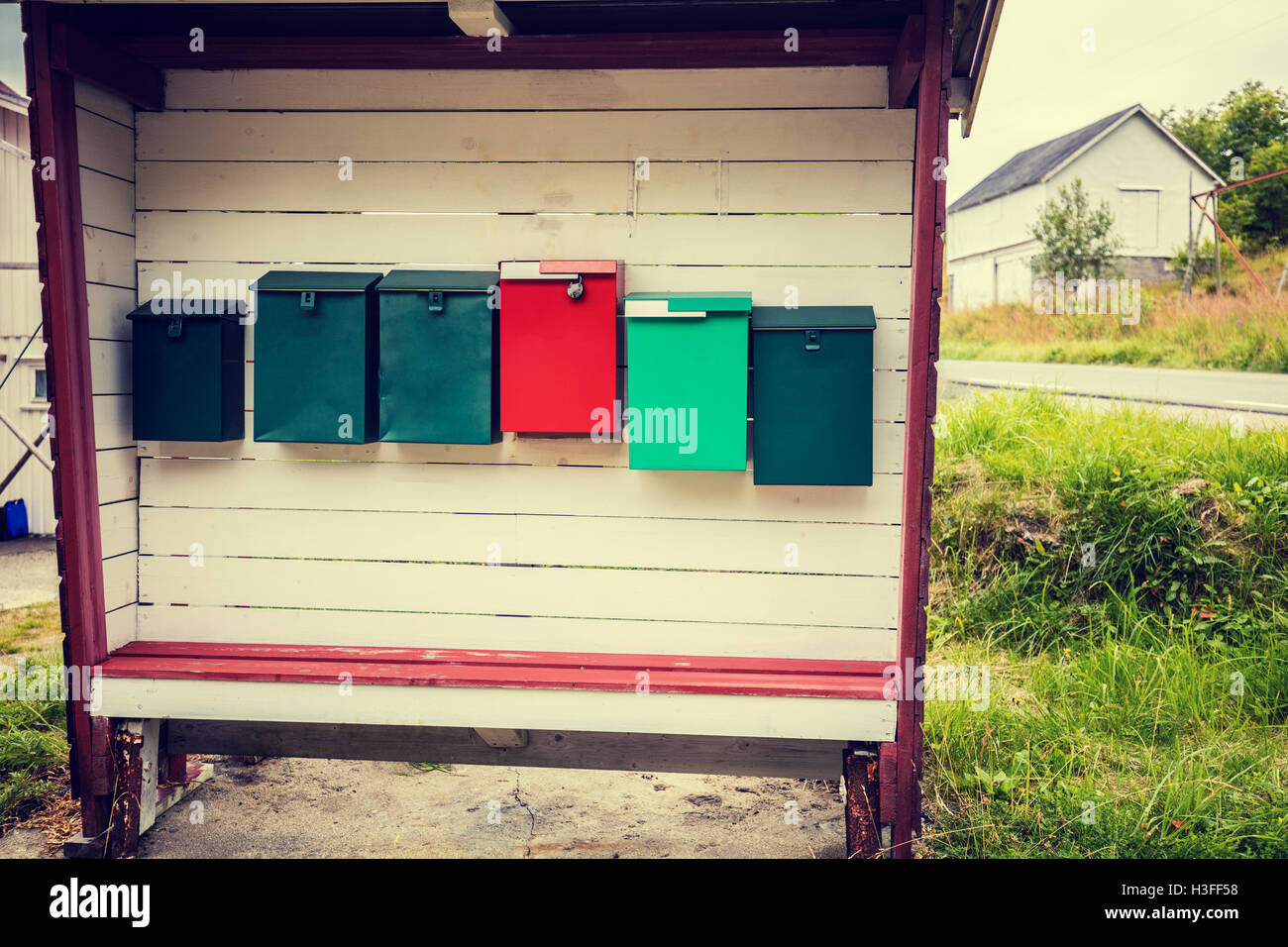 Post boxes on white wooden background on the street Stock Photo - Alamy