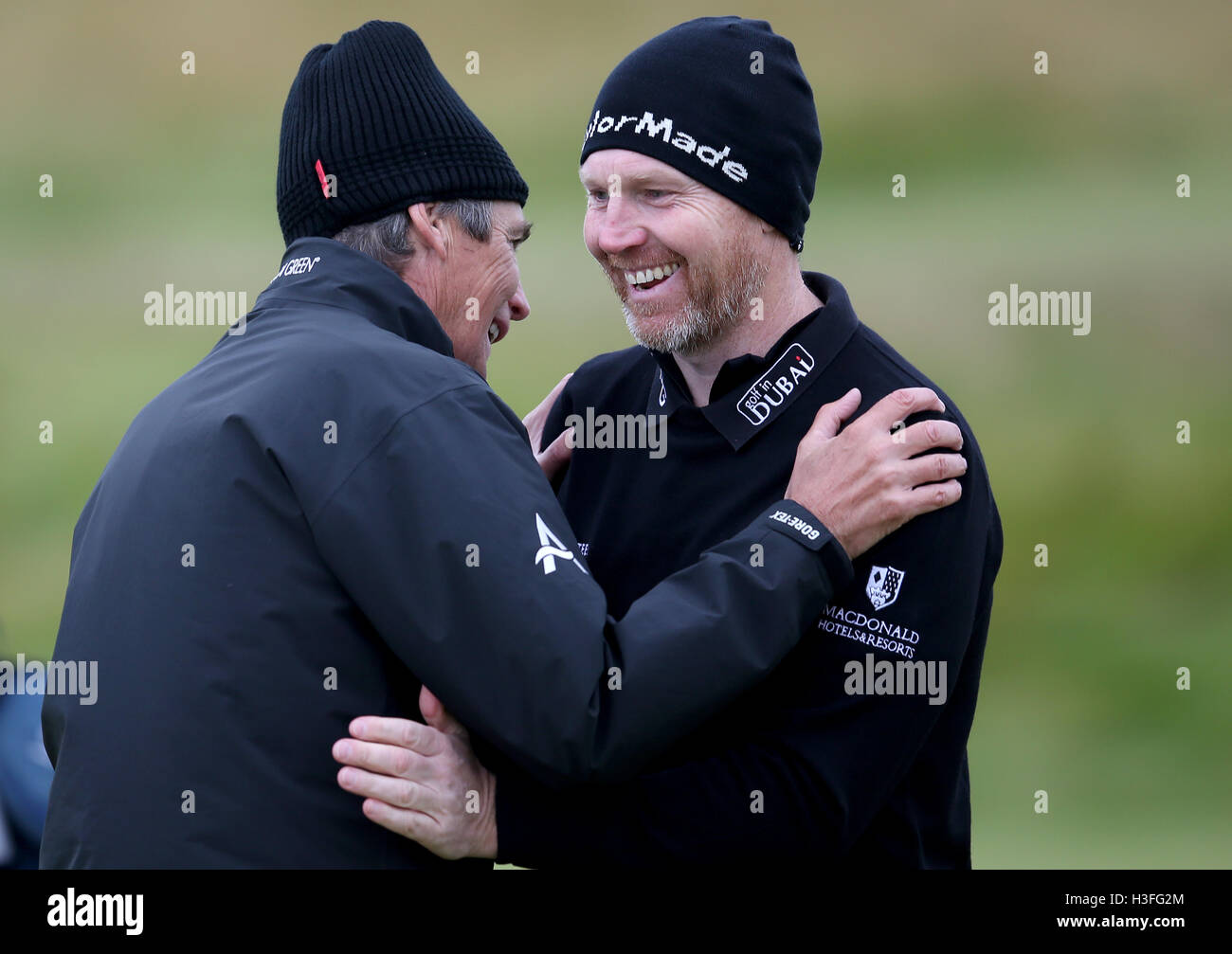 Alan Hanson (left) and Stephen Gallagher, on the 14th green, during day ...