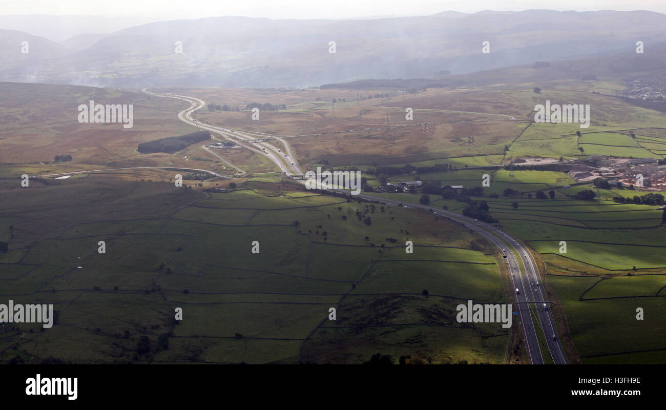 aerial view of the M6 motorway heading south through the Pennines ...