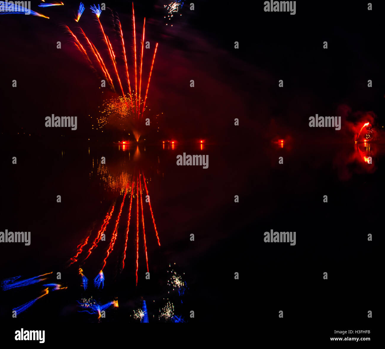 Fireworks reflections at night Stock Photo - Alamy