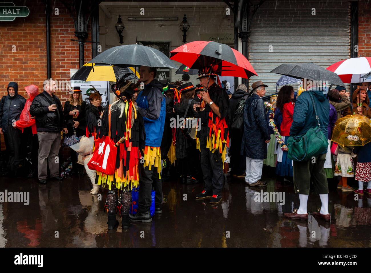 Morris Dancers Stand In The Rain Waiting To Perform In The 'Dancing In ...