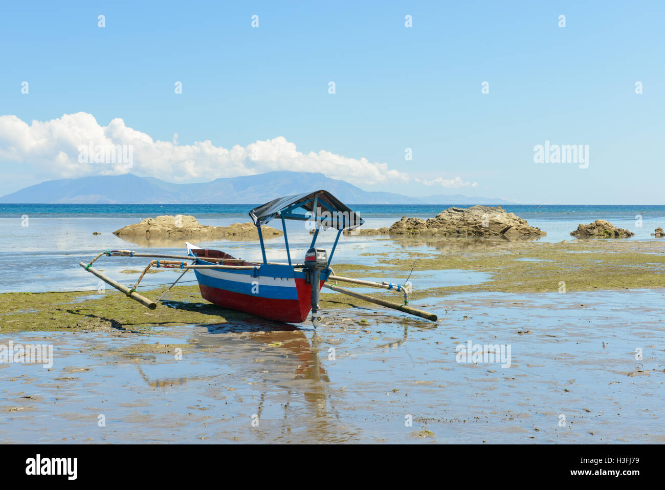 Fishing boat on the beach, Areia Branca, Dili, Timor Leste Stock Photo ...