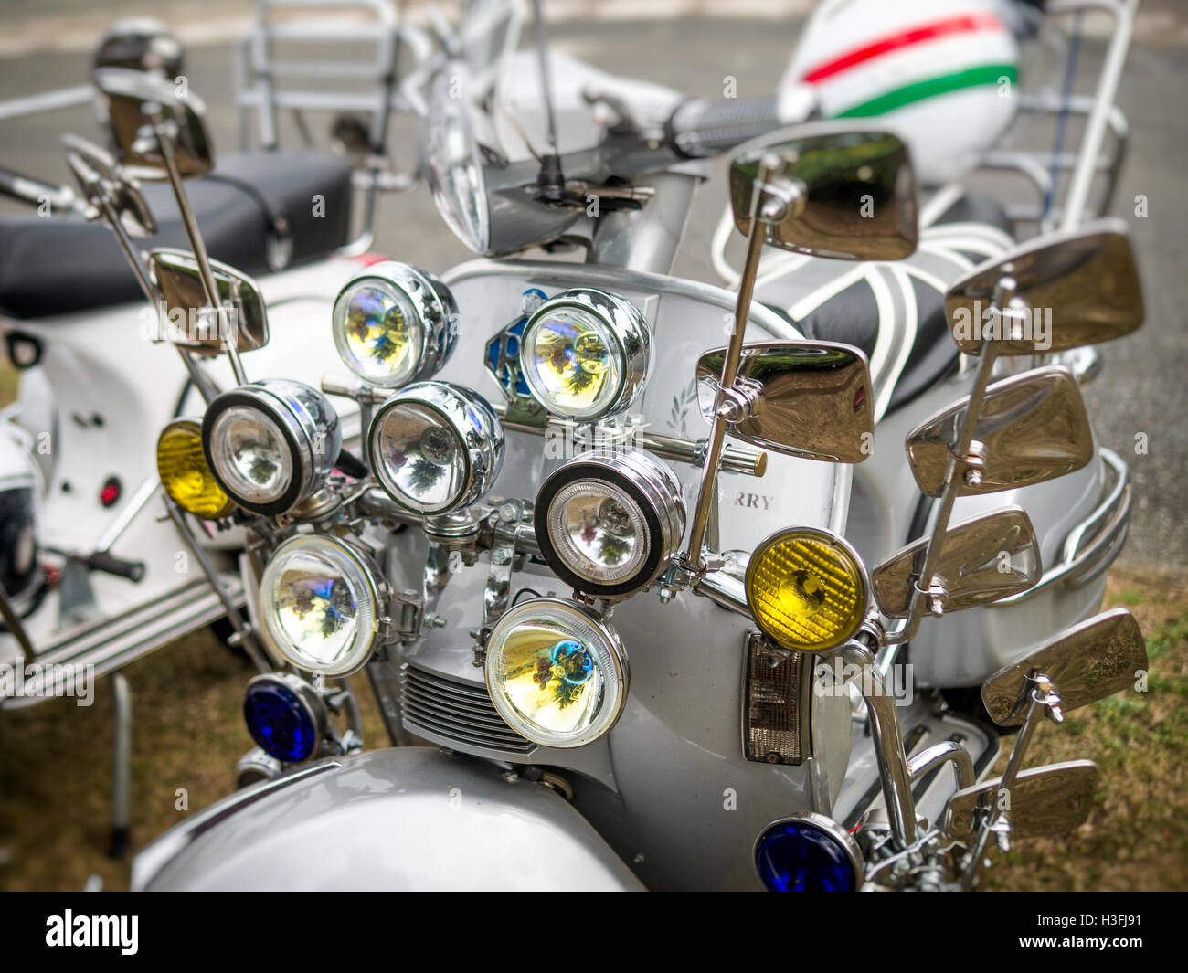 Vespa Scooter Headlight Detail Stock Photo - Alamy