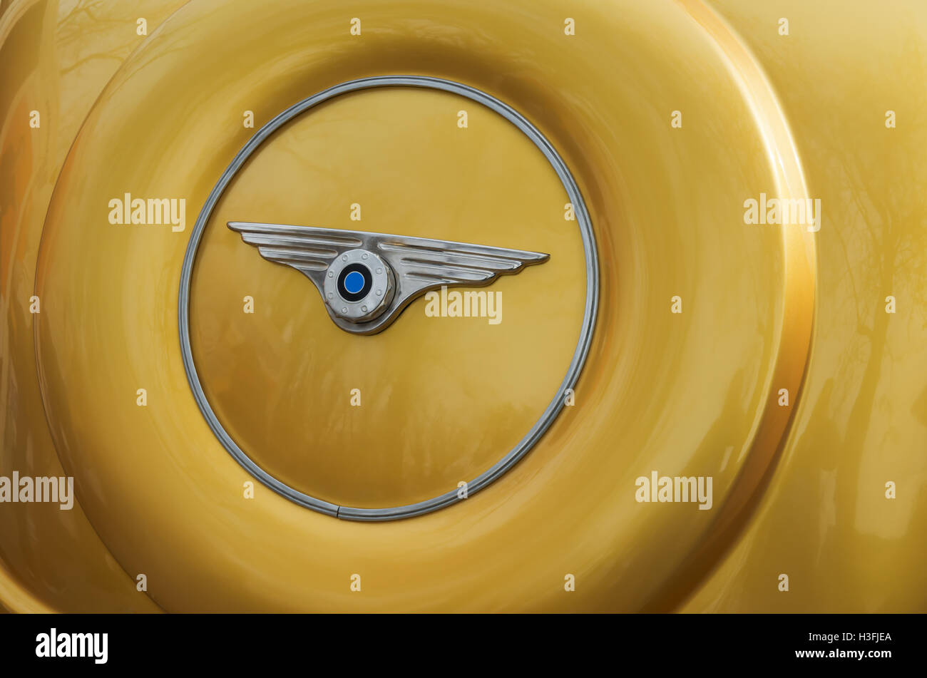 Spare wheel from an old retro car located behind baggage compartment ...