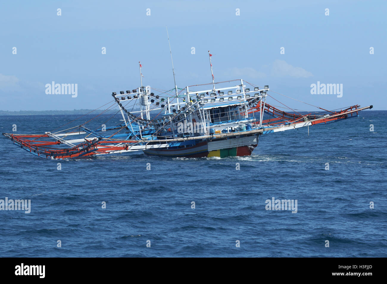 Winged fishing boat Stock Photo - Alamy