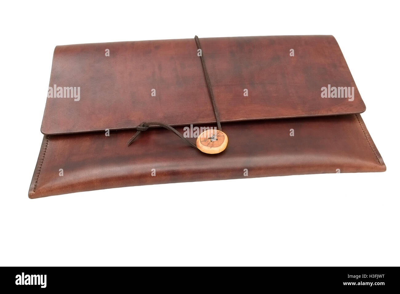 Dark brown leather document Wallet with leather tie. Isolated against a ...