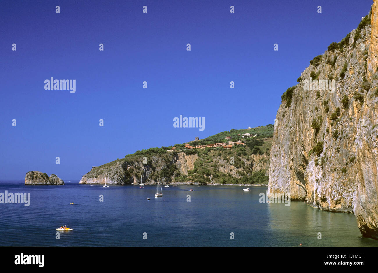 Rocky costline at Palinuro Cape, in the background on the left Coniglio ...