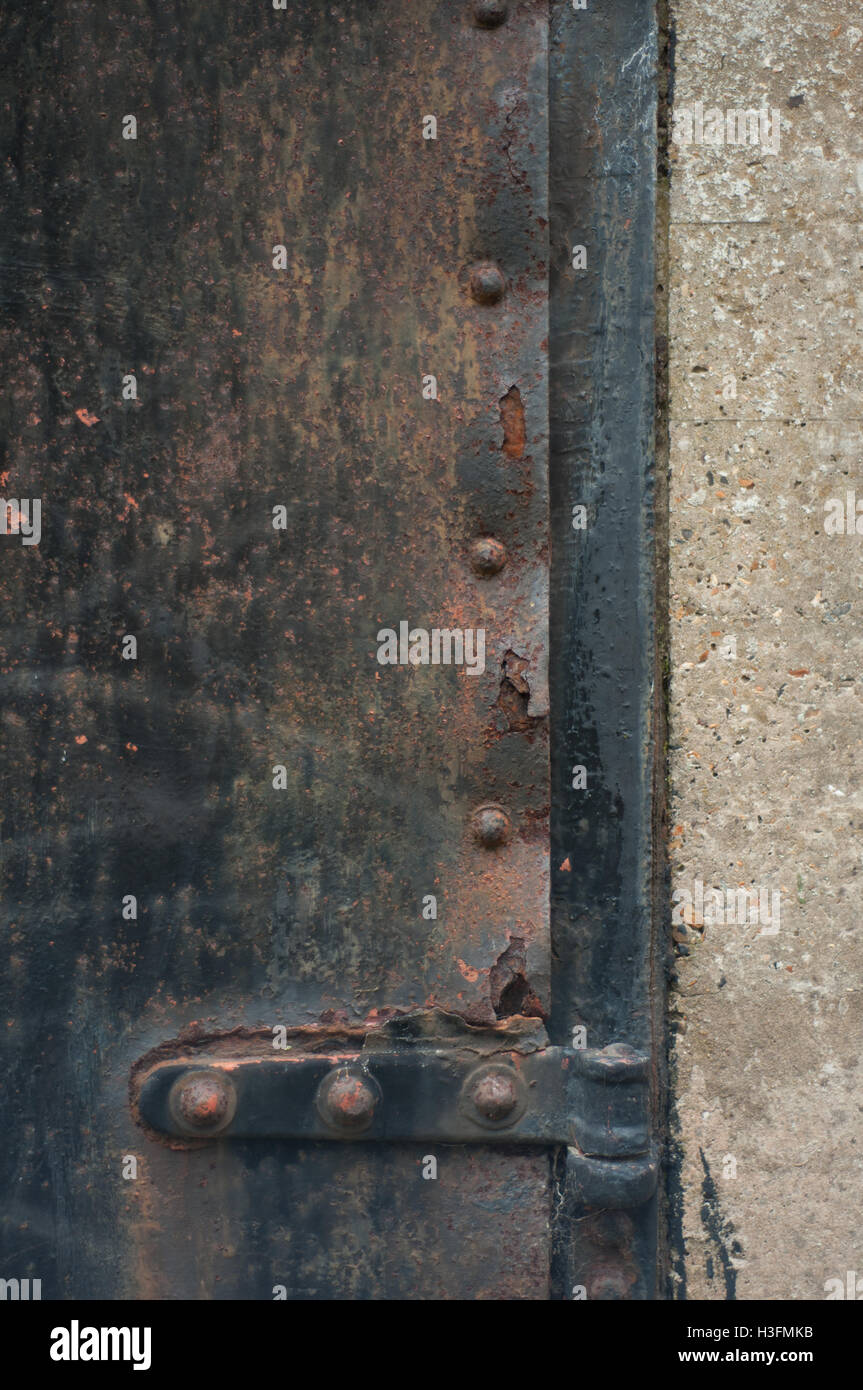Hinge and stile section of an old, rusted iron door Stock Photo - Alamy