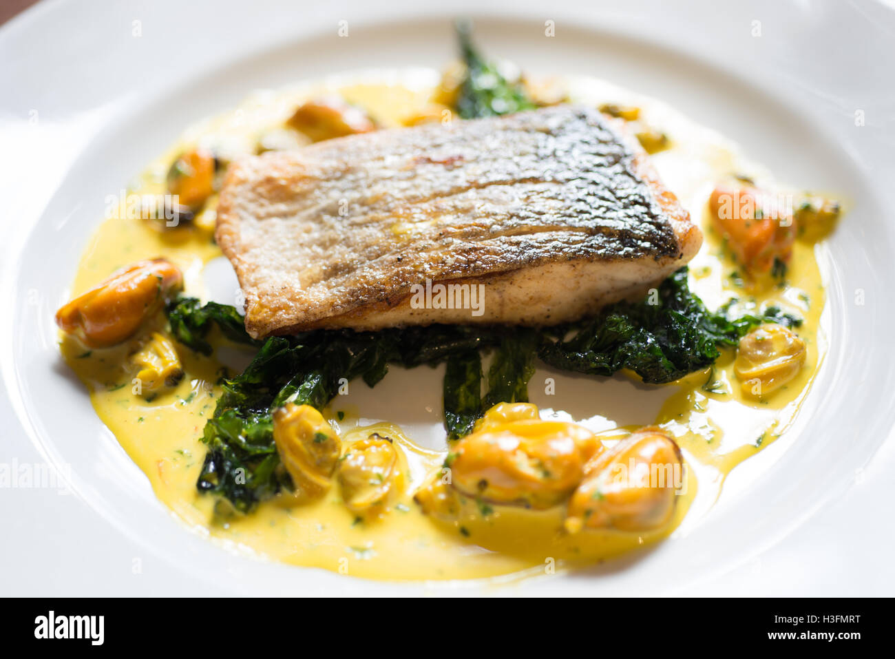 Dish fish sauce yellow hi-res stock photography and images - Alamy