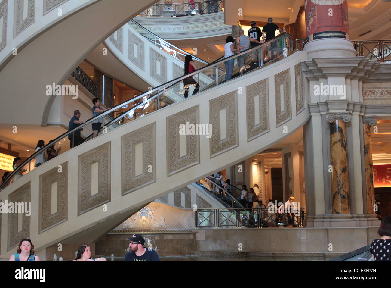 Spiral escalator shopping mall hi-res stock photography and images - Alamy