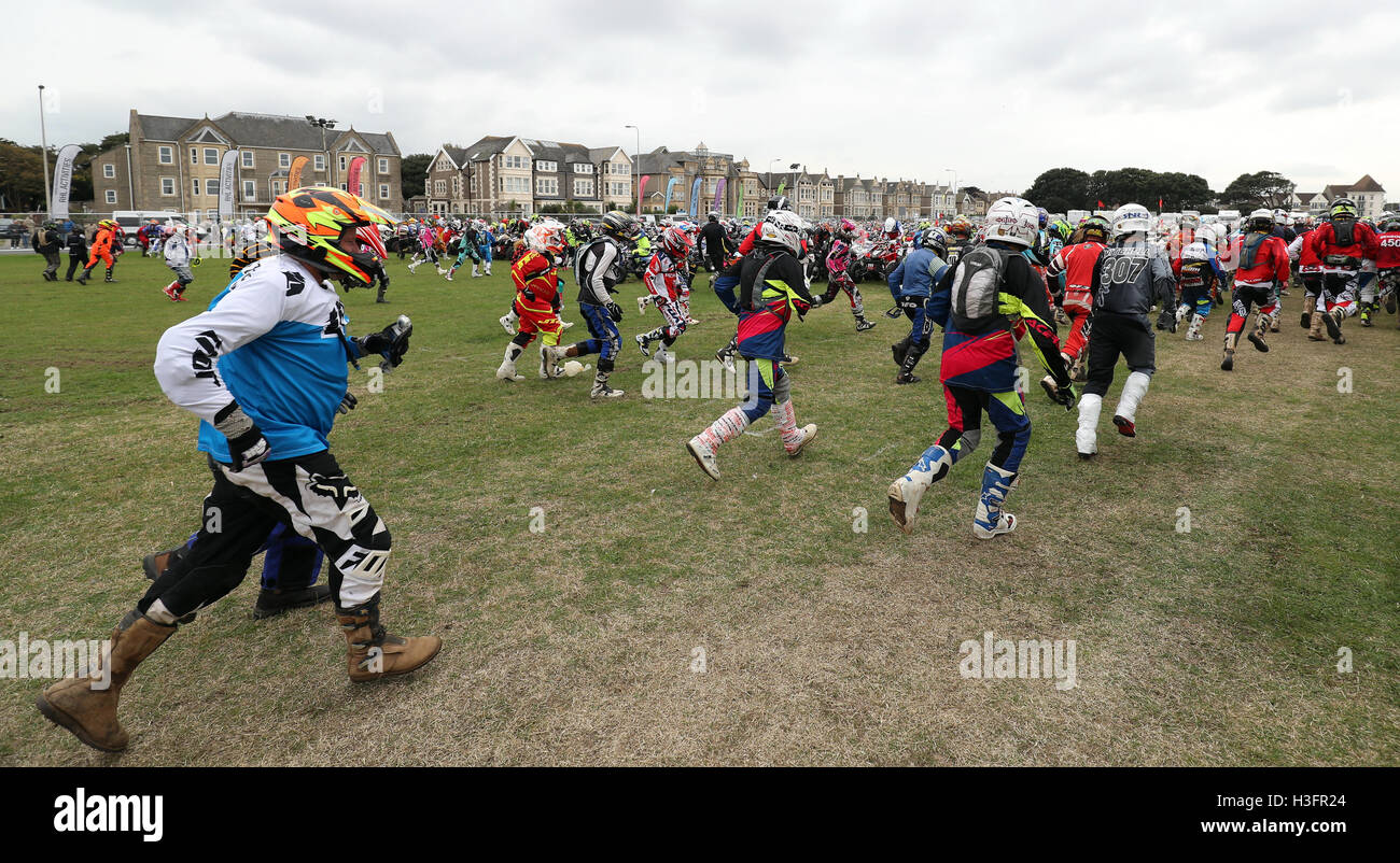 Riders race to their bikes before the HydroGarden Weston beach Quad and ...
