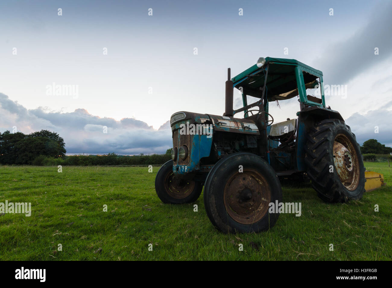 A tractor in a field Stock Photo - Alamy