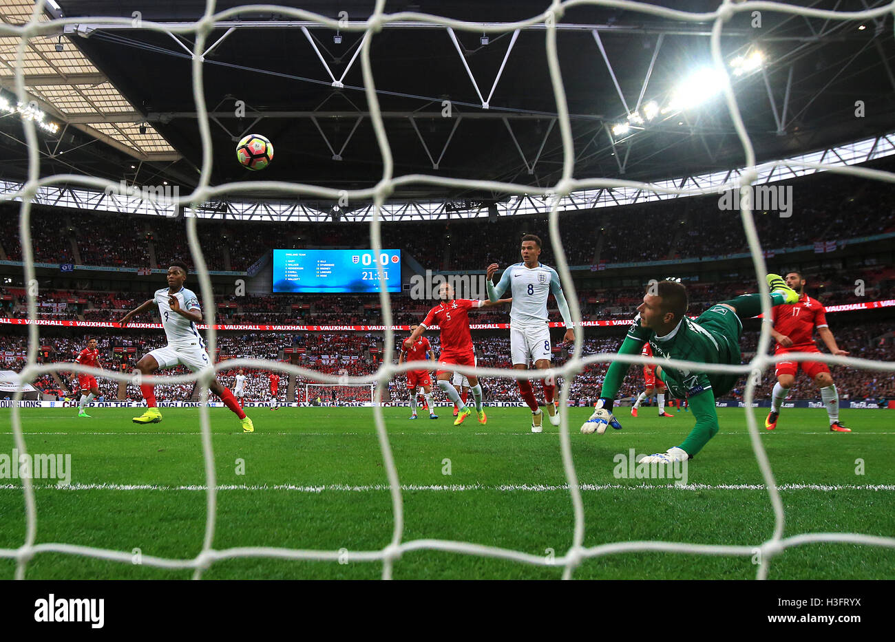 Malta goalkeeper Steve Borg saves from England's Dele Alli during the ...