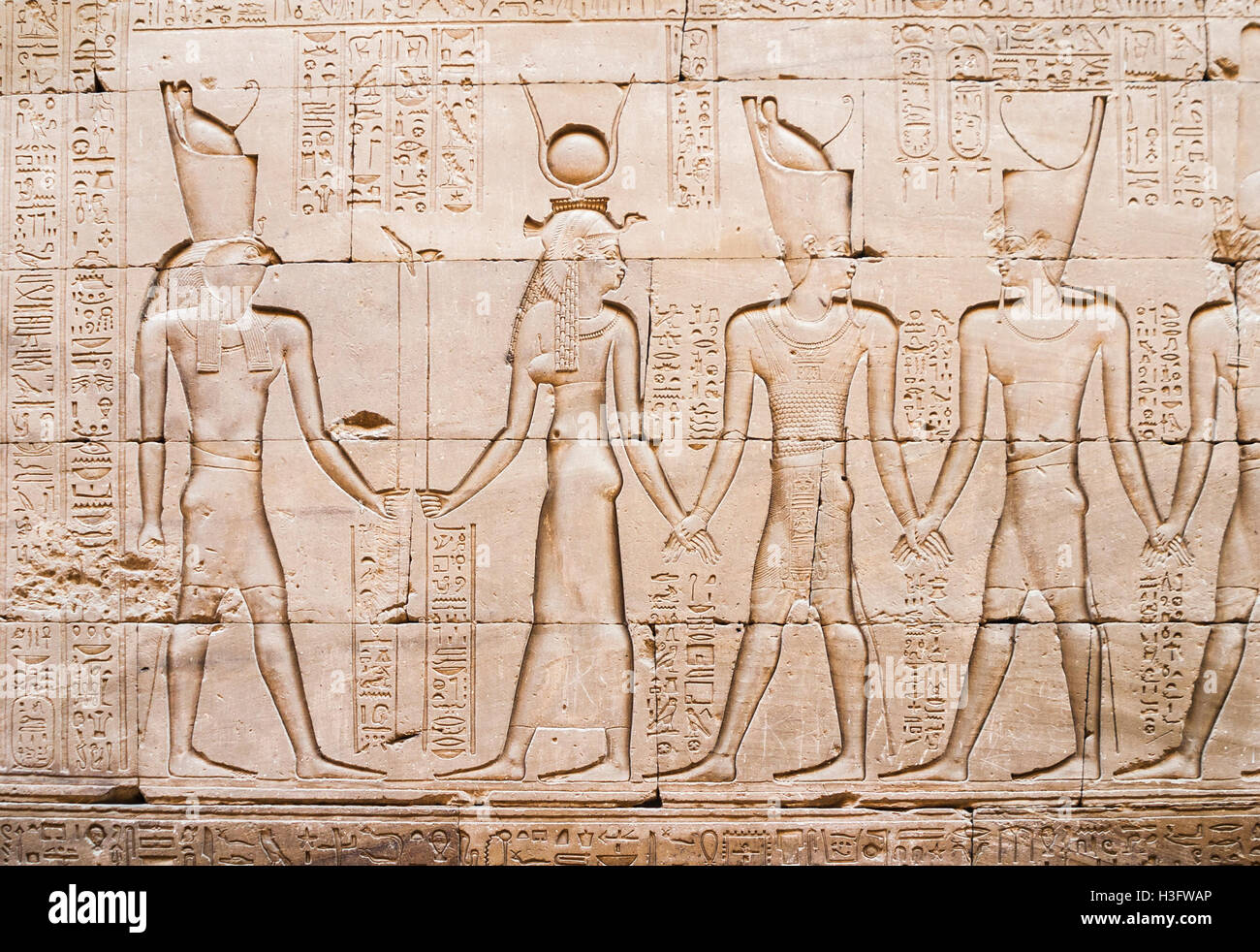 Wall relief of Horus with goddess wife Hathor and others at the Temple ...