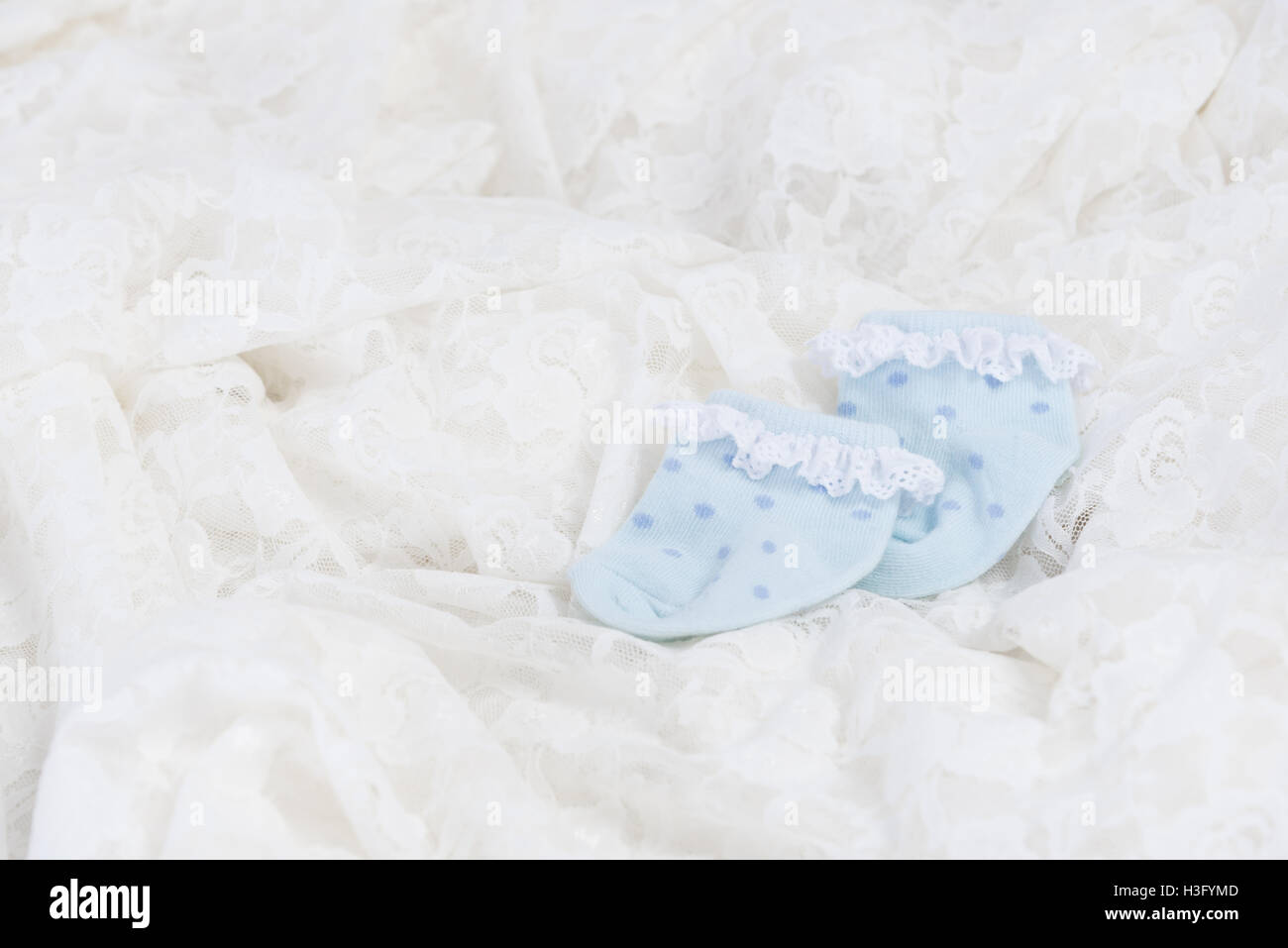 Blue baby socks for new born baby Stock Photo - Alamy