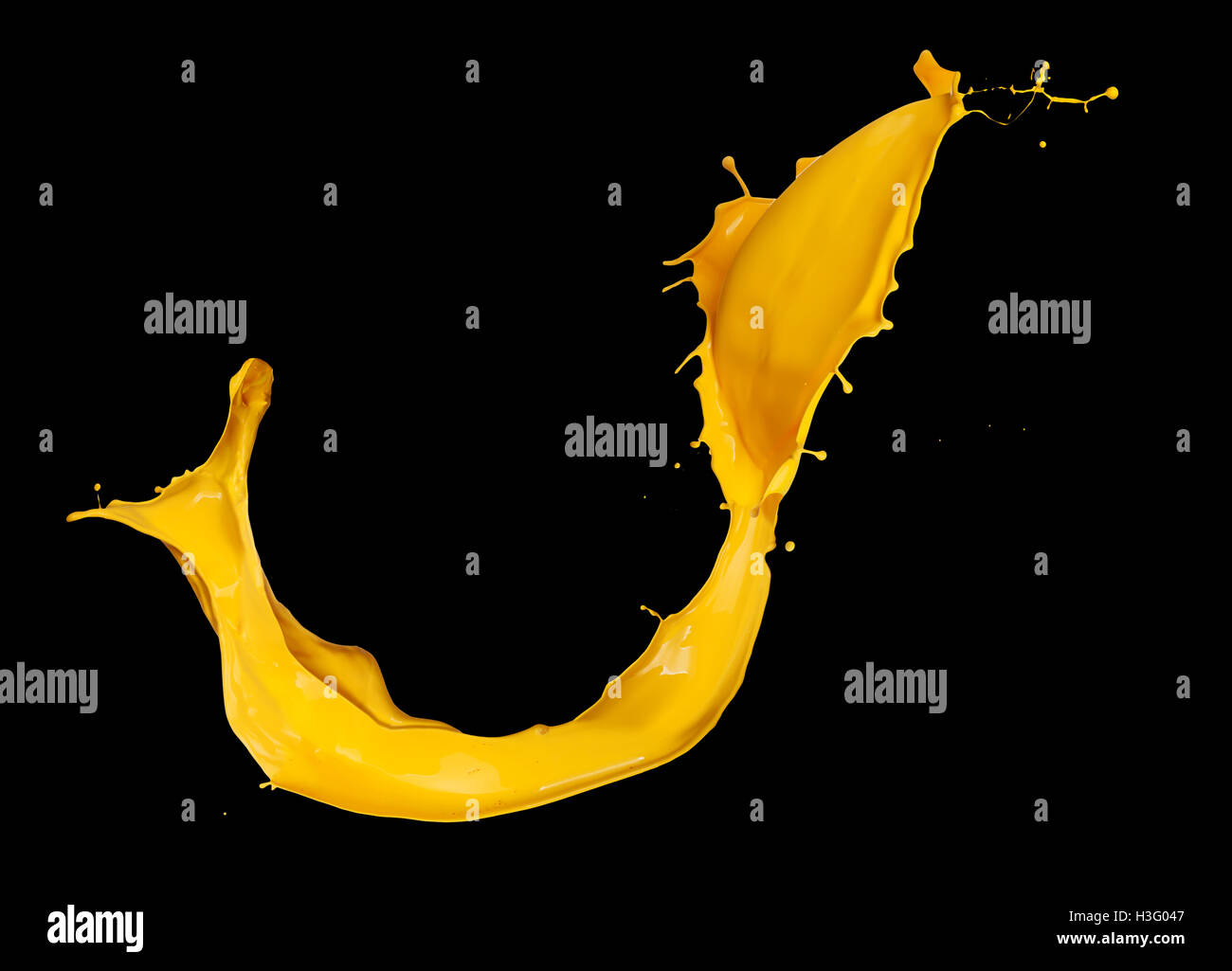 abstract yellow splash isolated on black background Stock Photo - Alamy