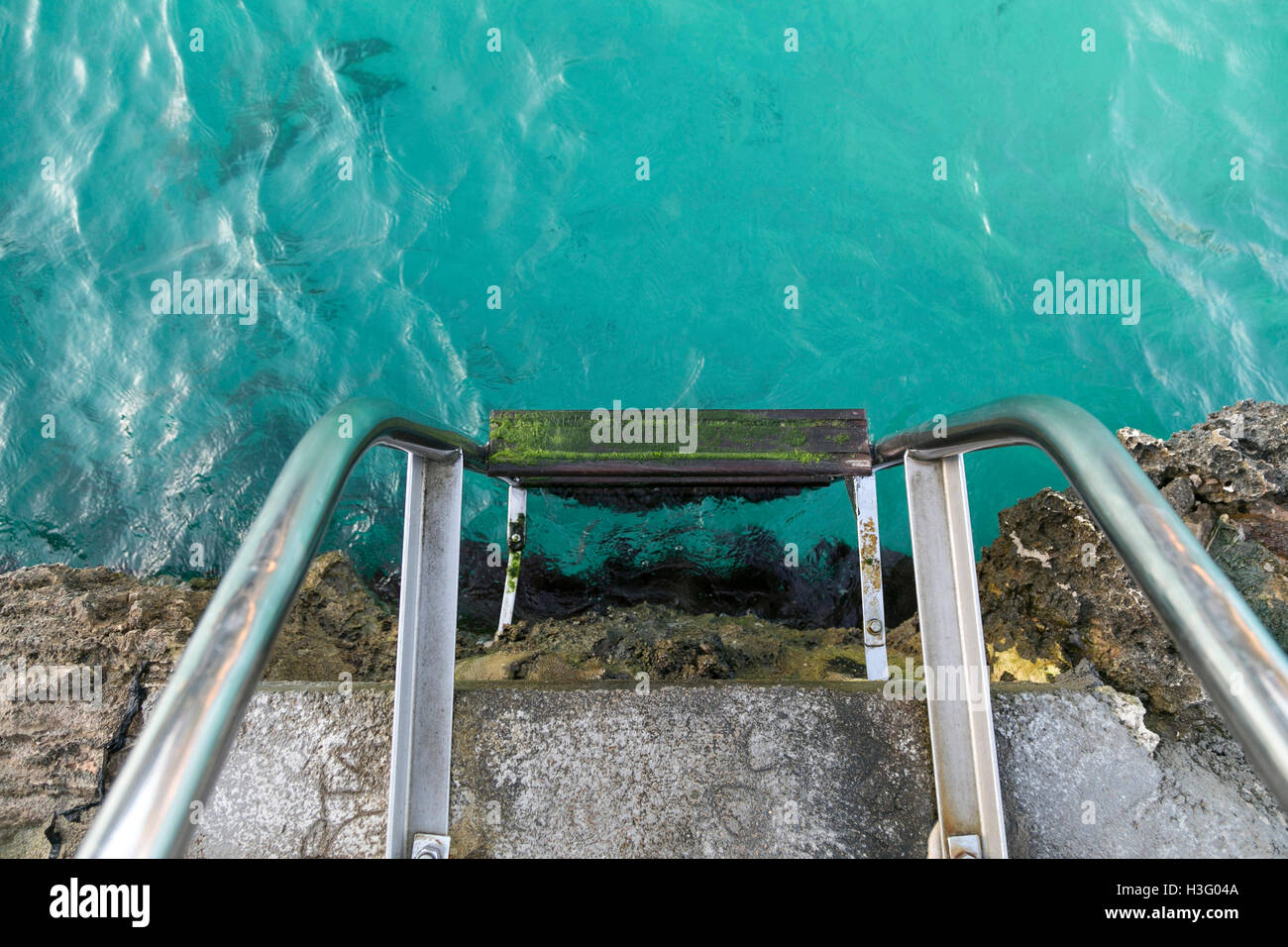 Sea ladder in a blure and clear water Stock Photo - Alamy