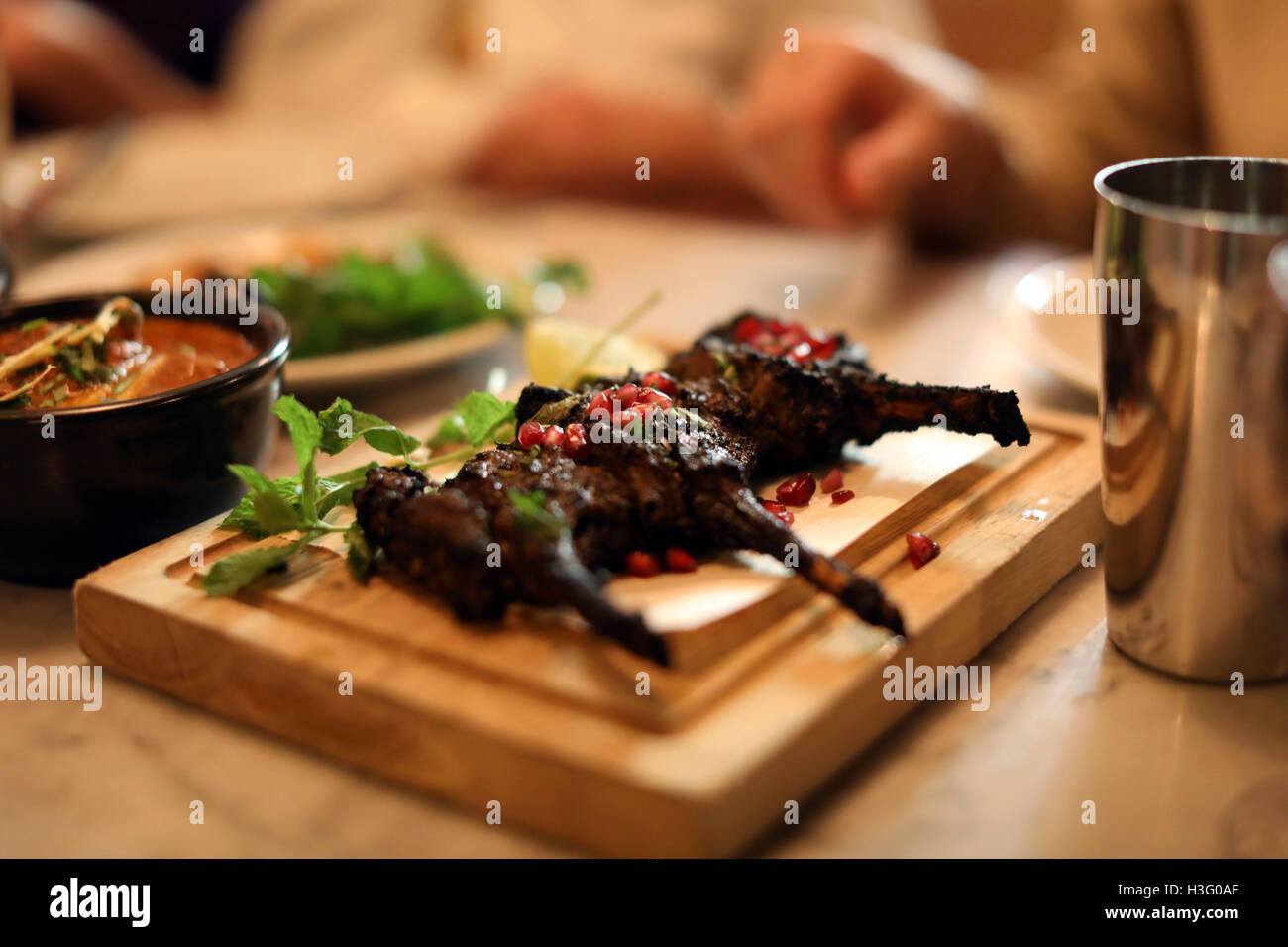 Dishoom restaurant King's Cross trendy Indian food Stock Photo - Alamy