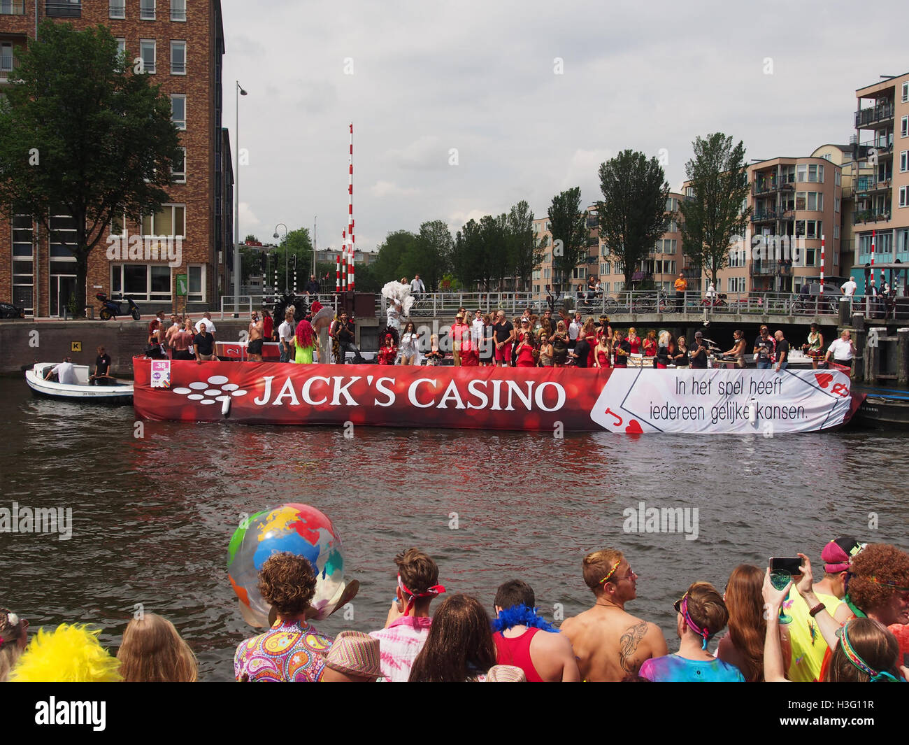 This image captures a moment from the 2016 Pride Canal Parade, an ...