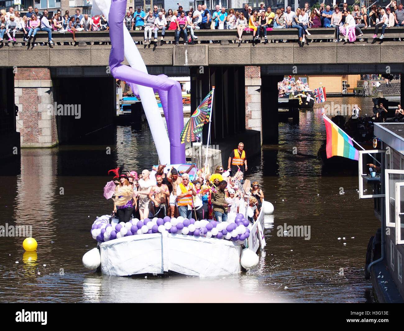 The image captures a moment from the 2016 Pride Canal Parade, a ...