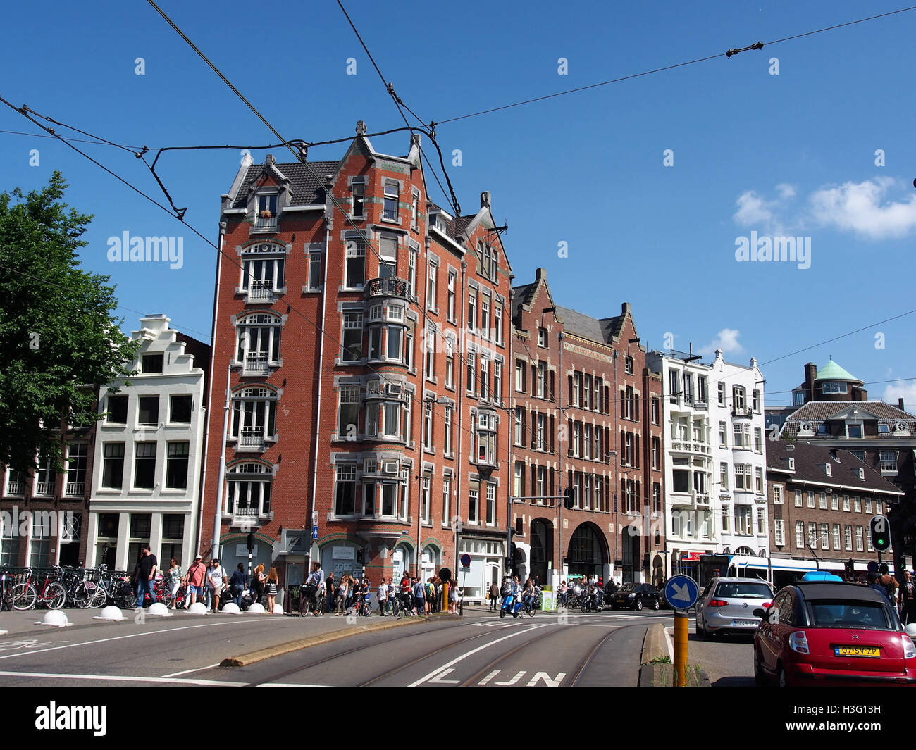 This photograph captures the Westermarkt area along the Keizersgracht ...
