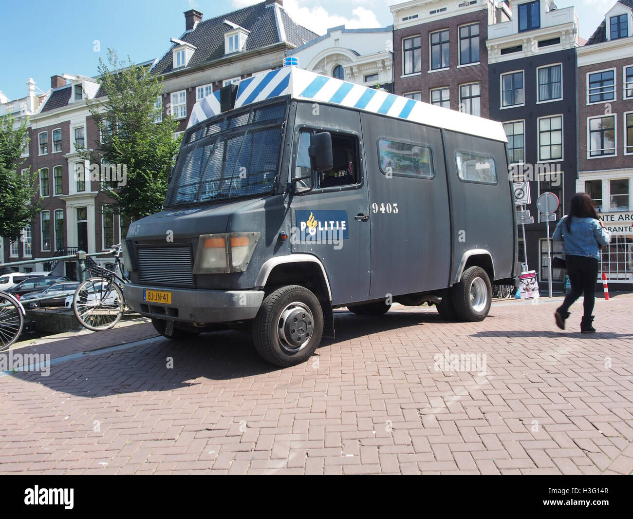This photograph depicts the Politiebusje 9403, a police vehicle, on the ...