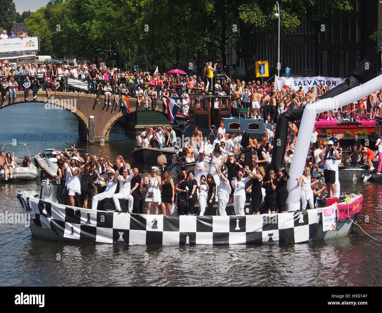 This photograph from the 2016 Pride Canal Parade features the USS ...
