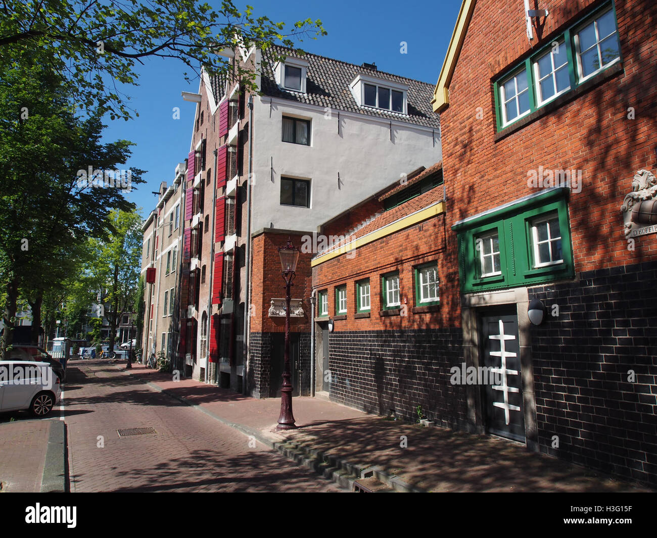 This image from the Houtkopersburgwal in Amsterdam showcases the iconic ...
