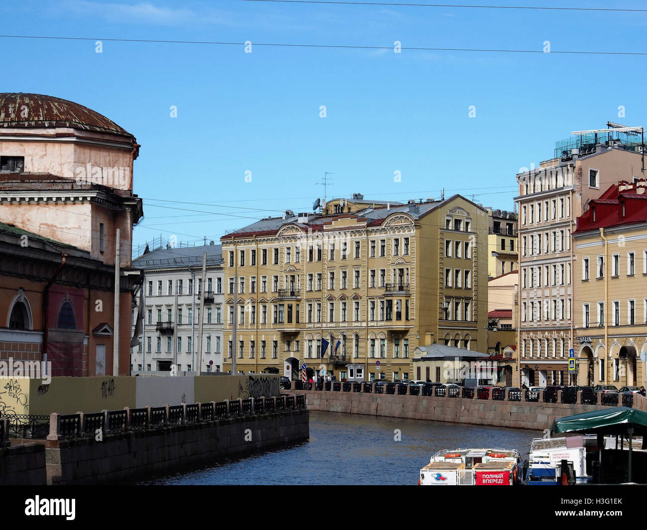 This photograph depicts the Moyka River embankment in St. Petersburg ...