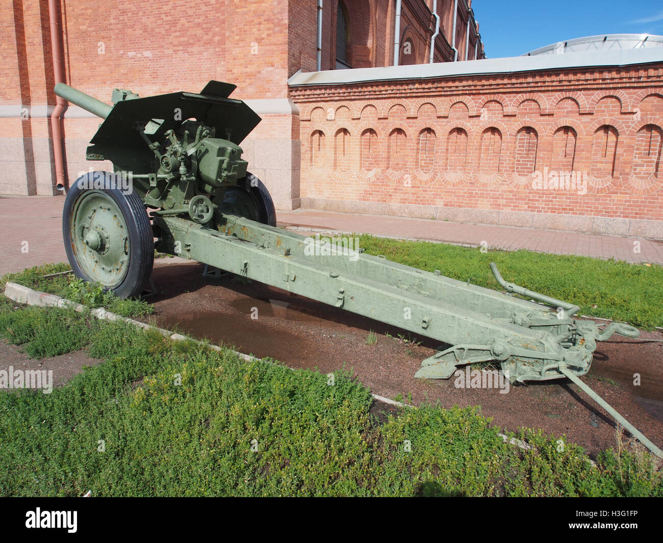 This photograph captures artillery pieces positioned outside the ...