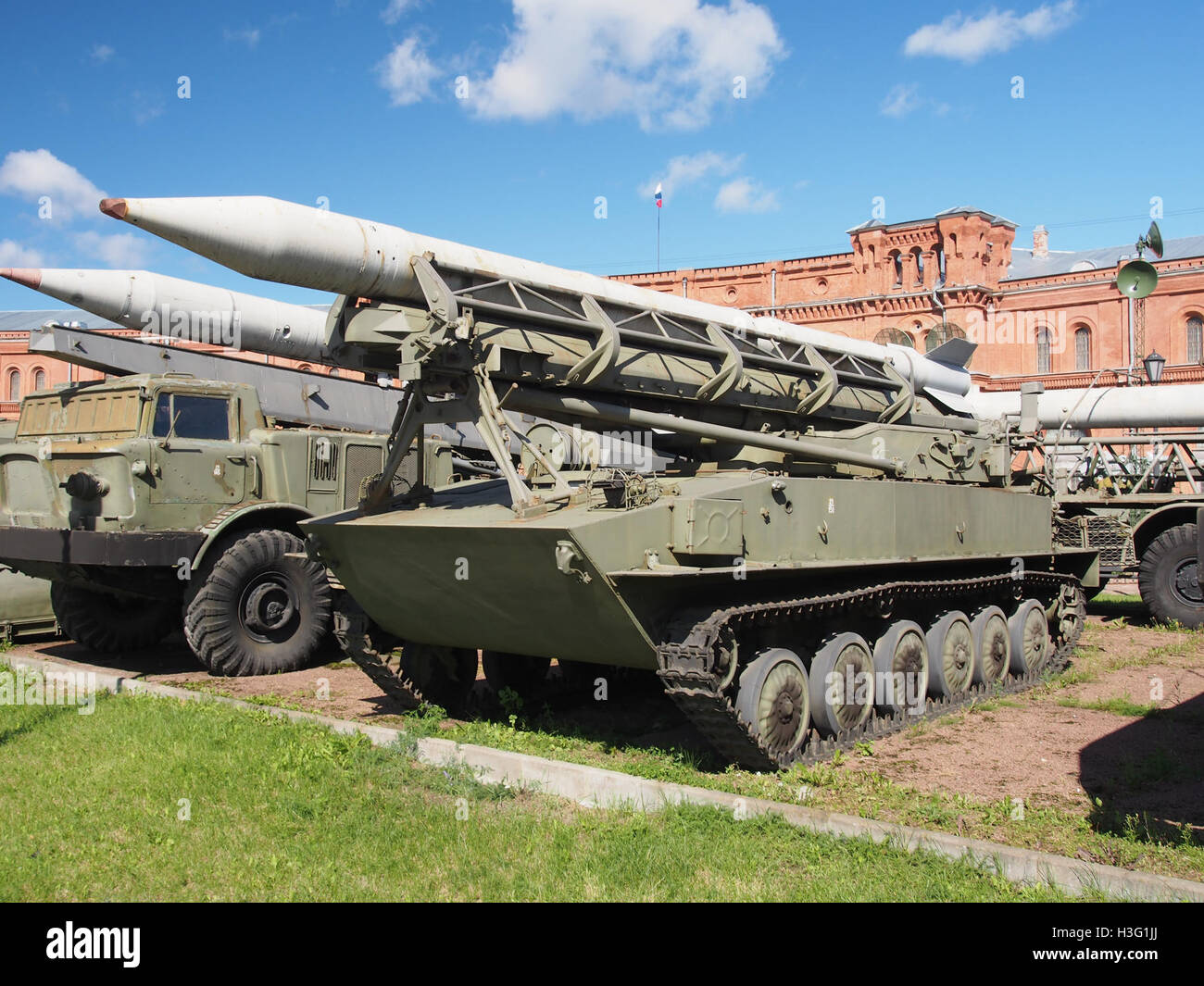 This image shows the *2P16 TEL 2K6 Luna missile system* on display at ...