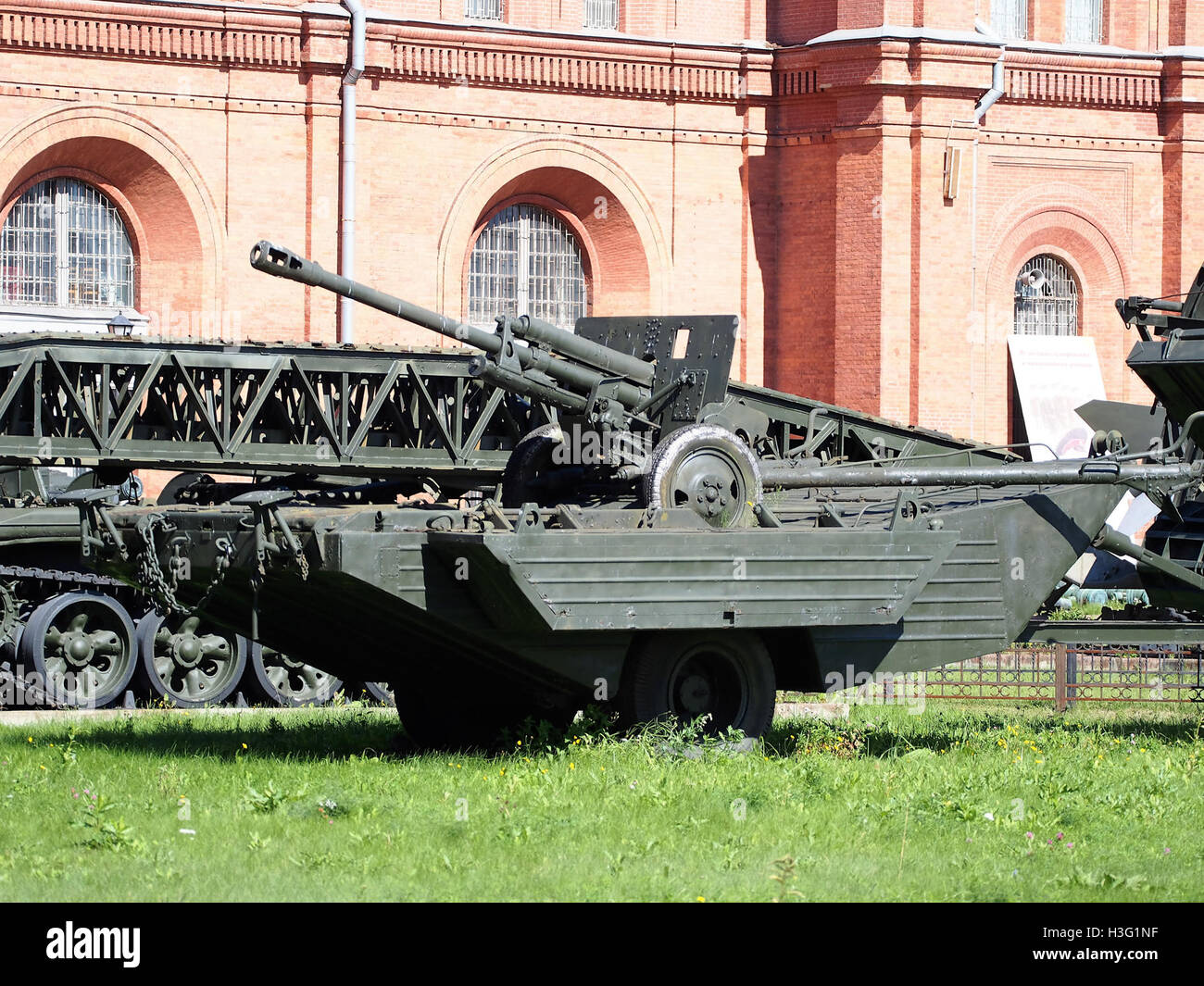 This photograph depicts a military artillery trailer stationed in the ...