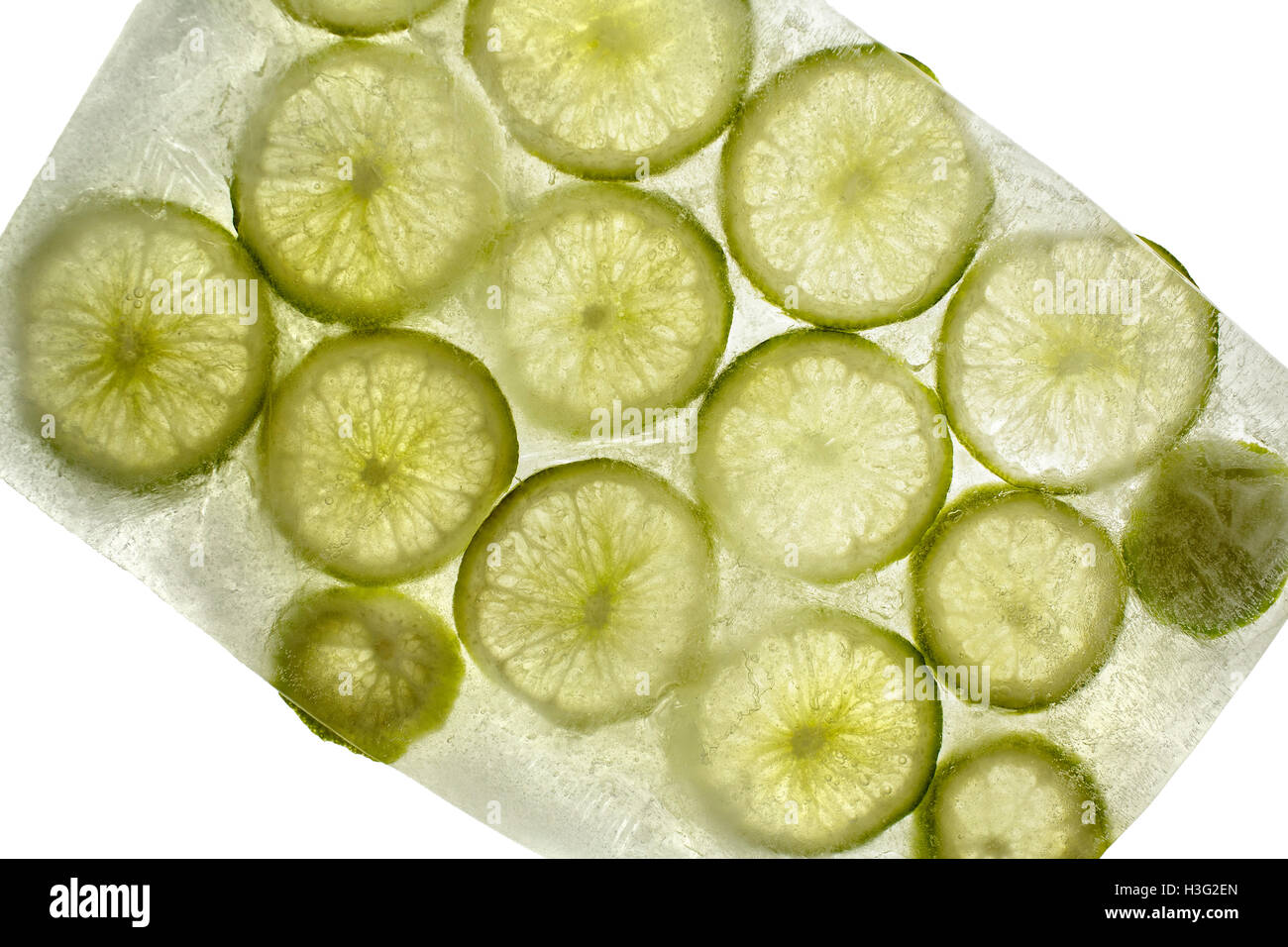 Ice Block with Slices of frozen Lime Fruit Stock Photo - Alamy