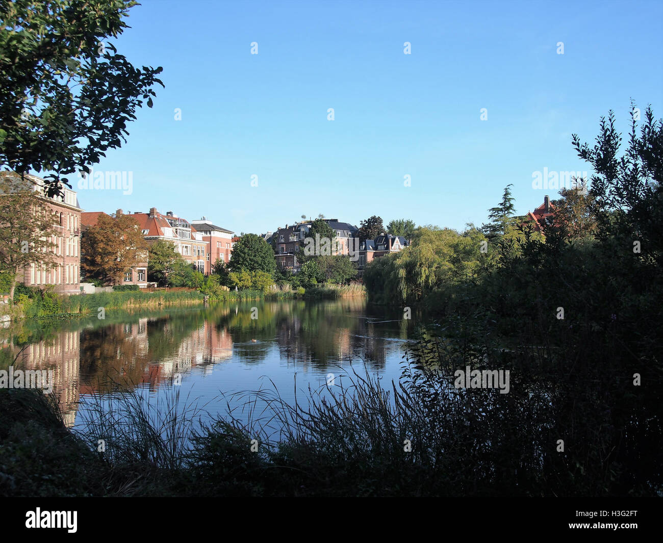 This photograph captures a view of the pond in Vondelpark, Amsterdam ...