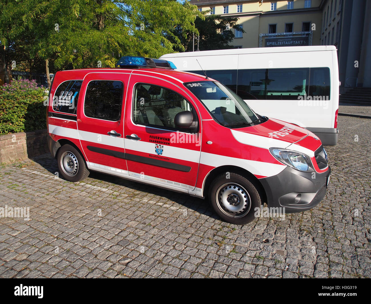 The photograph shows a Mercedes Feuerwehr vehicle from the Saarbrücken ...