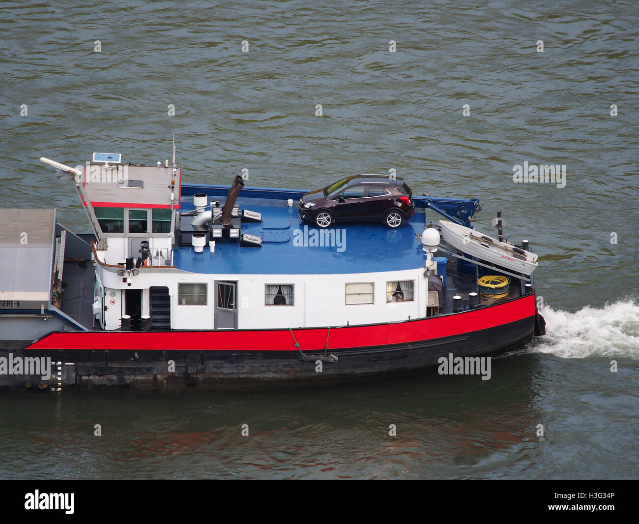 The *Ganges* (ship, 1954) is pictured navigating the Rhine River near ...
